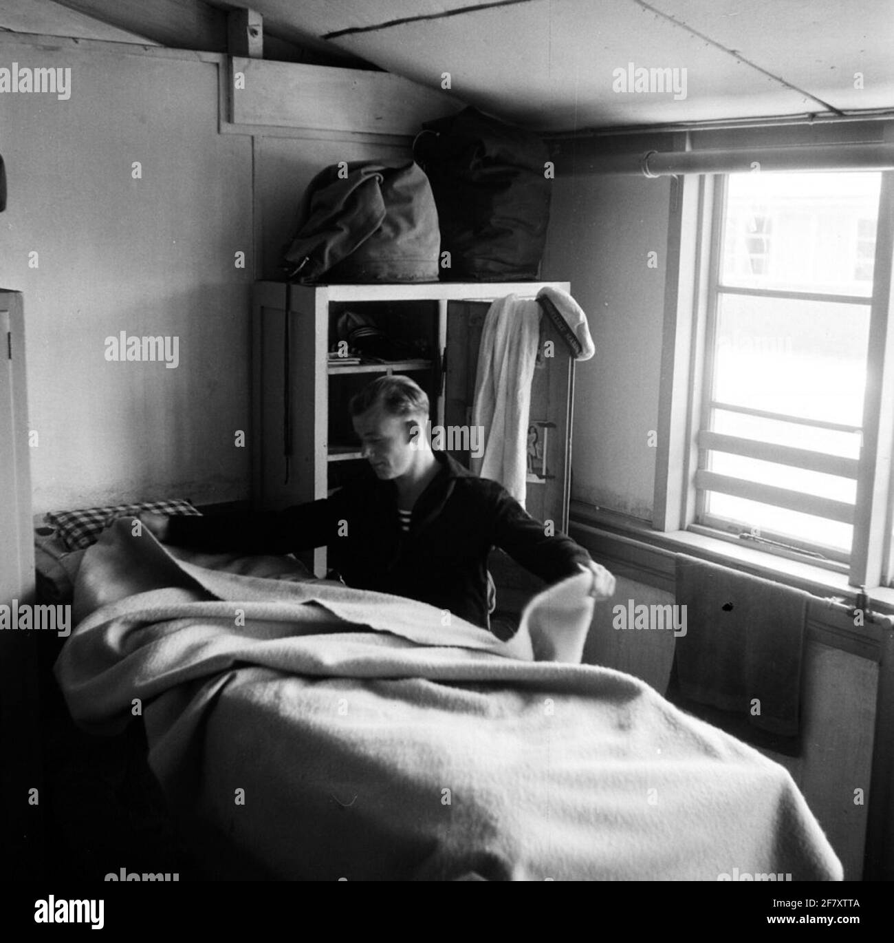 Creating beds is a fixed daily part at the armed forces. On the photo a ...