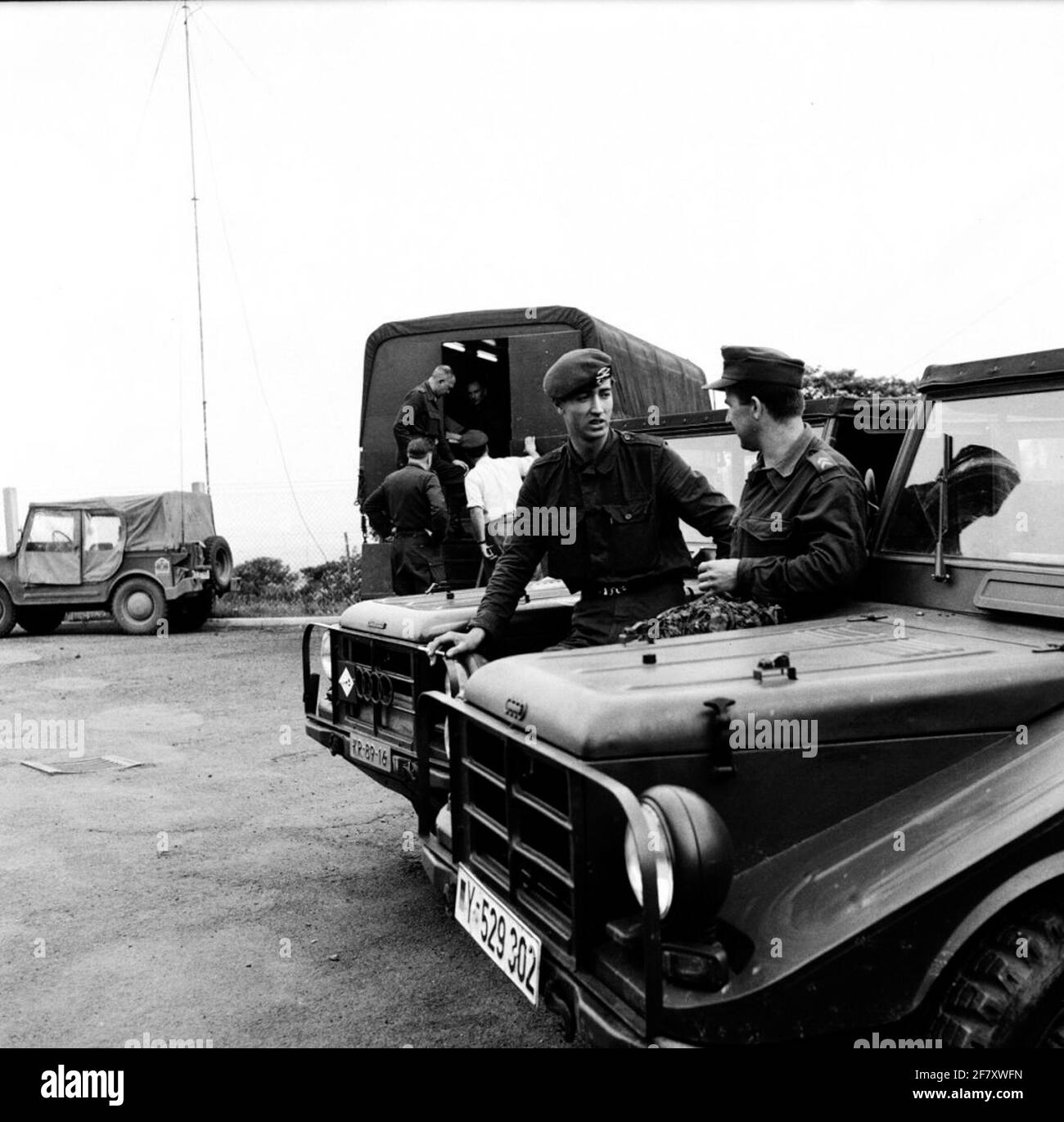 A Dutch and German soldier talking to each other during exercises of ...