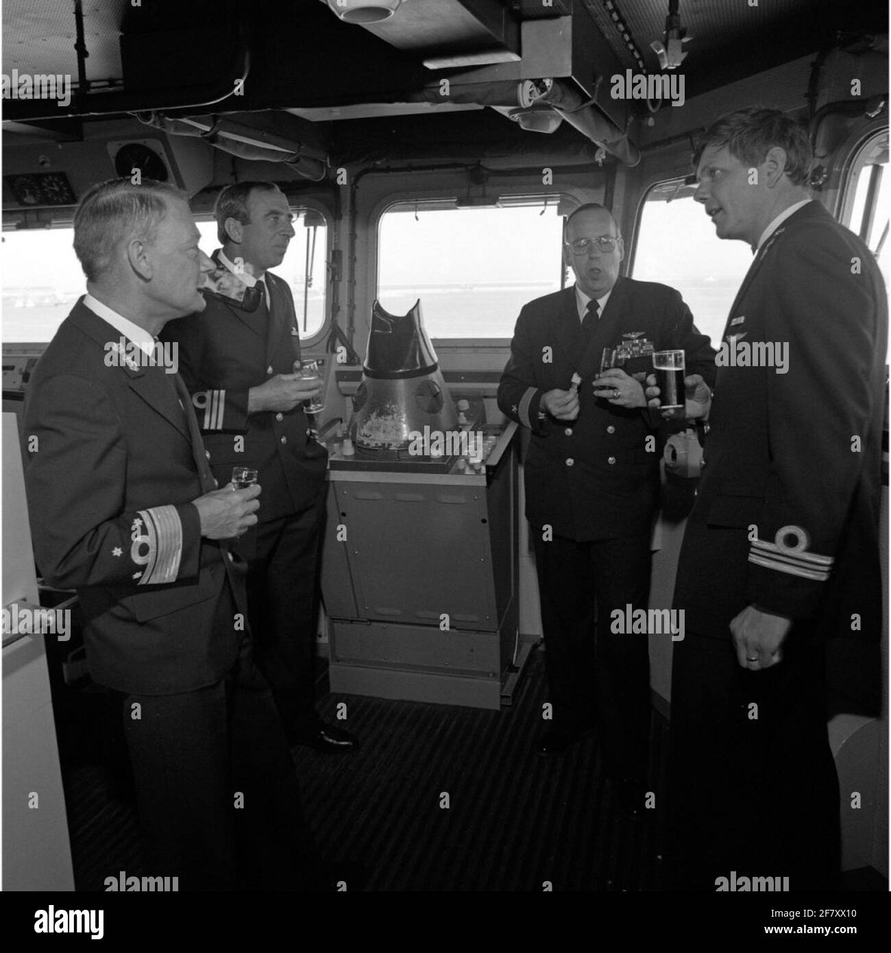 An American Admiral (second from the right) visits the naval base Den ...