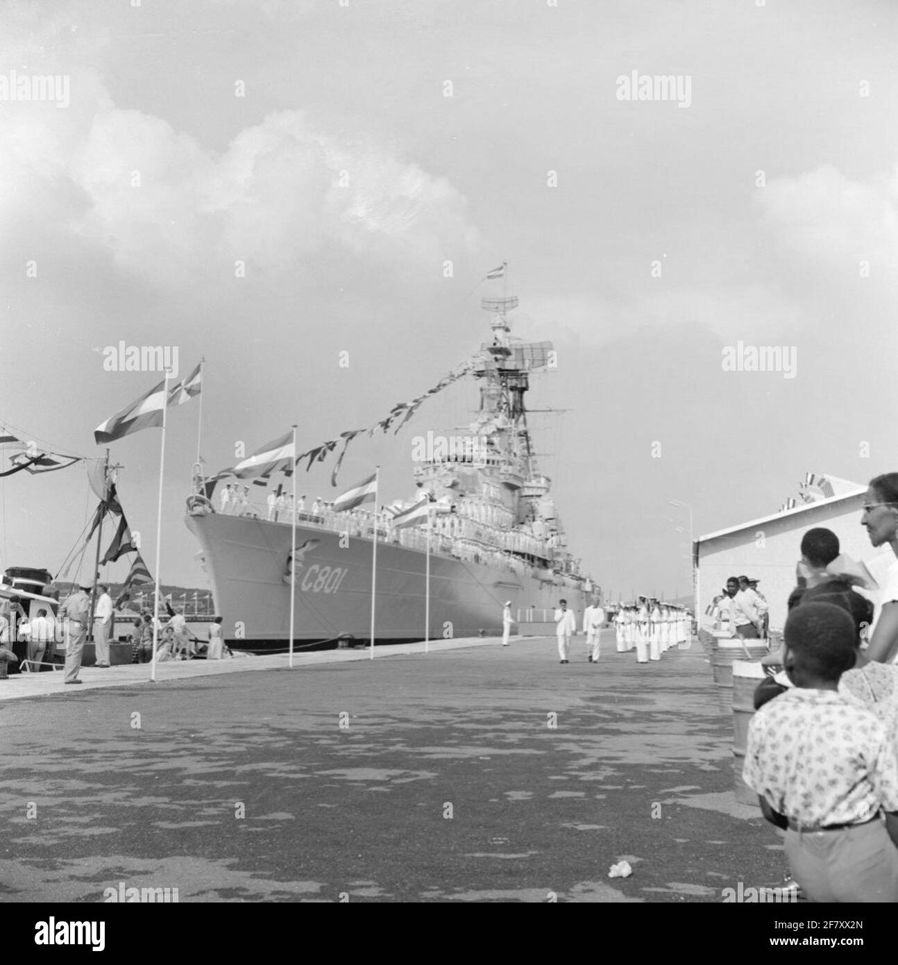 The pavourized cruiser Hr.Ms. De Ruyter (C 801) on the quay in ...