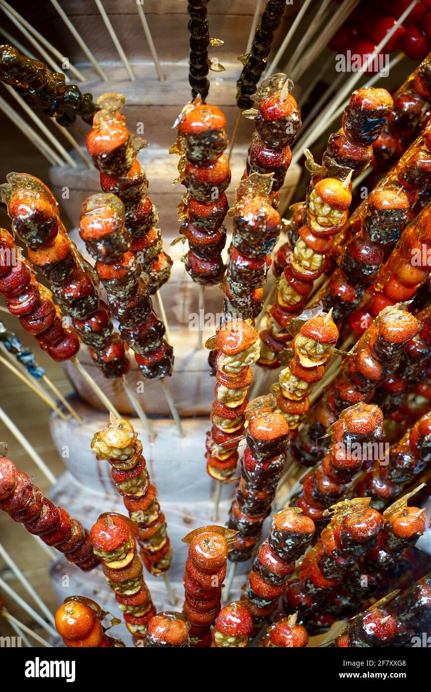 Sugar coated haws on a stick hi-res stock photography and images - Alamy