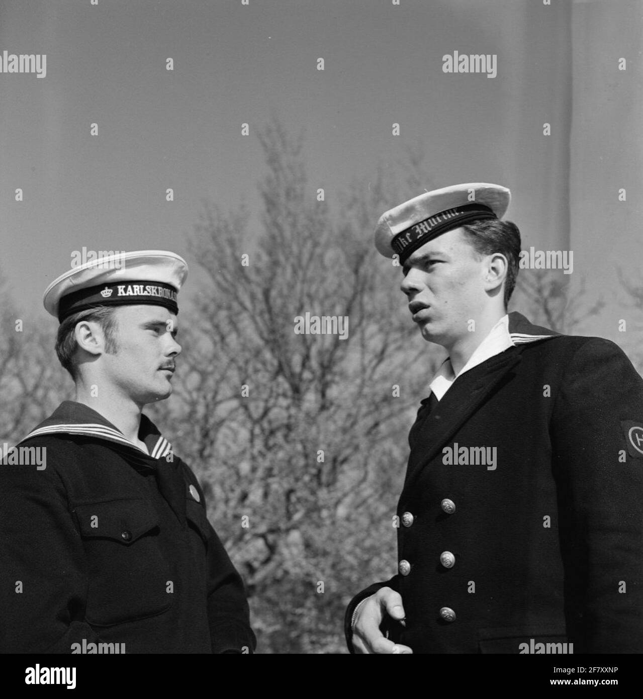 Dutch sailor in conversation with a Swedish sailor during a visit from ...