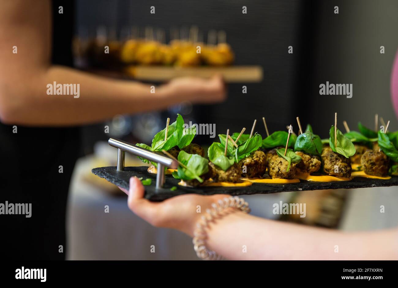 Tray food hands hi-res stock photography and images - Alamy