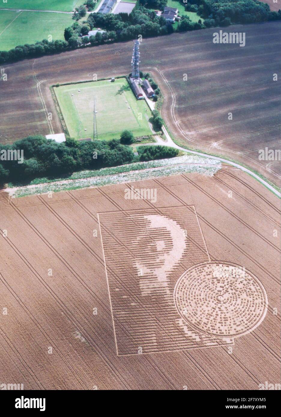 THE FACE OF AN ALIEN ALONGSIDE A COMPUTER DISC AT SPARSHOLT NEAR ...