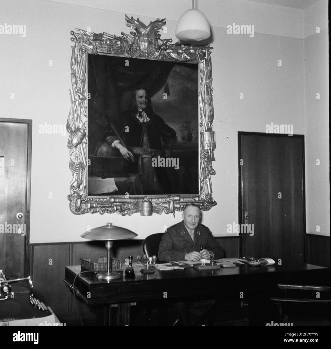 A Colonel doctor behind his desk in the military hospital in Utrecht ...