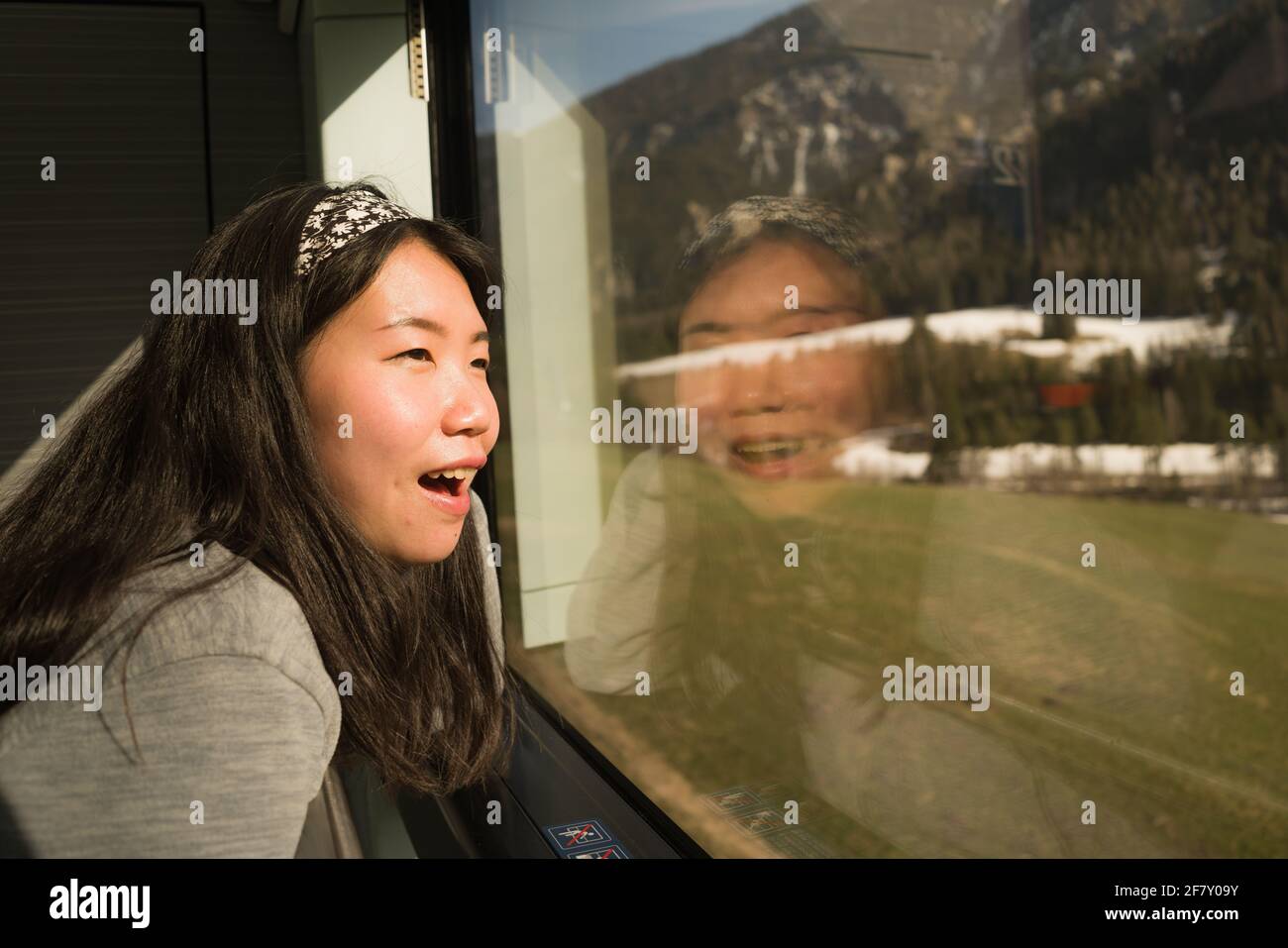 train travel getaway - lifestyle portrait of young happy and beautiful ...