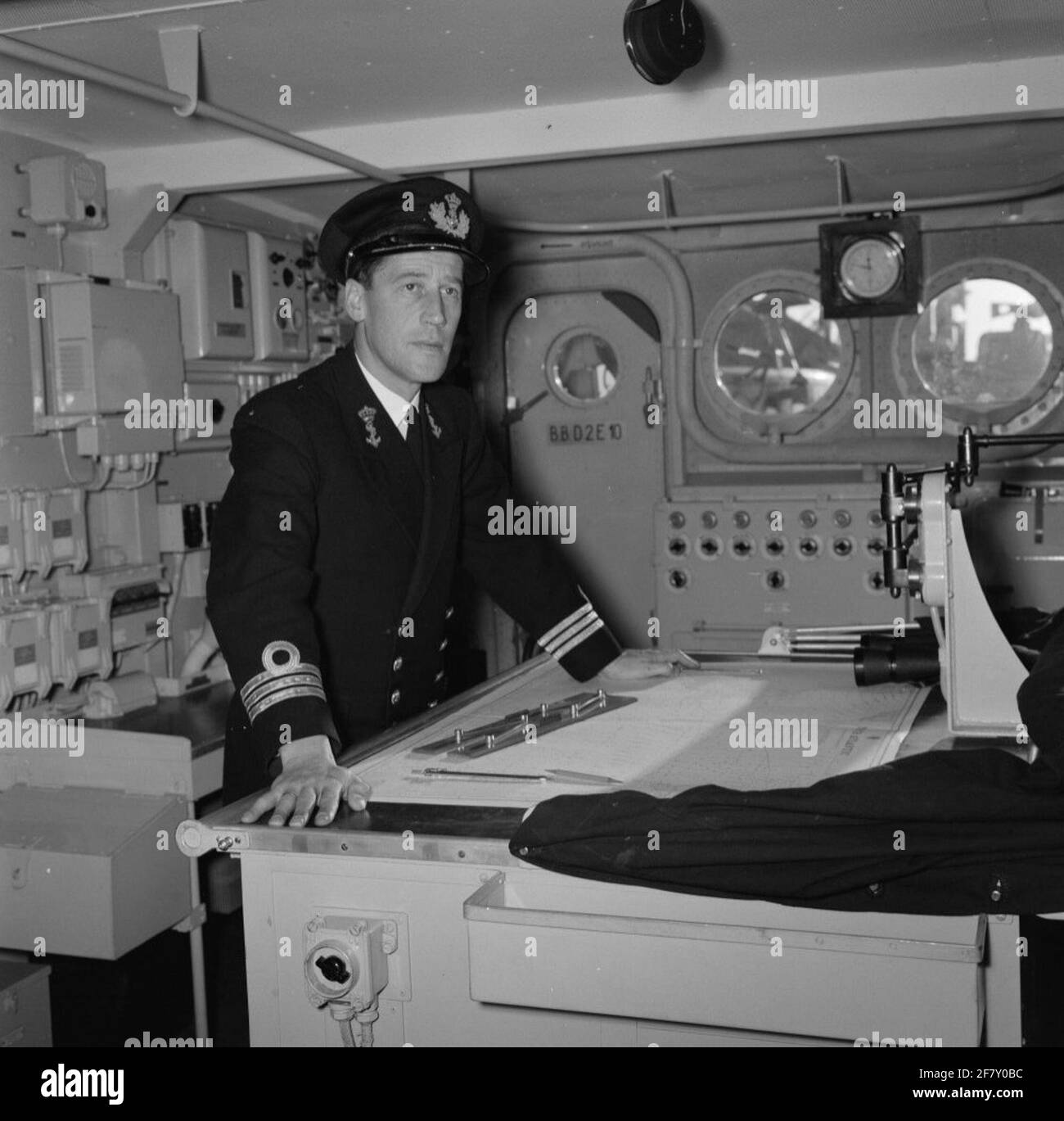 The commander of the submarine hunter Hr.Ms. Amsterdam (D 819) Captain ...