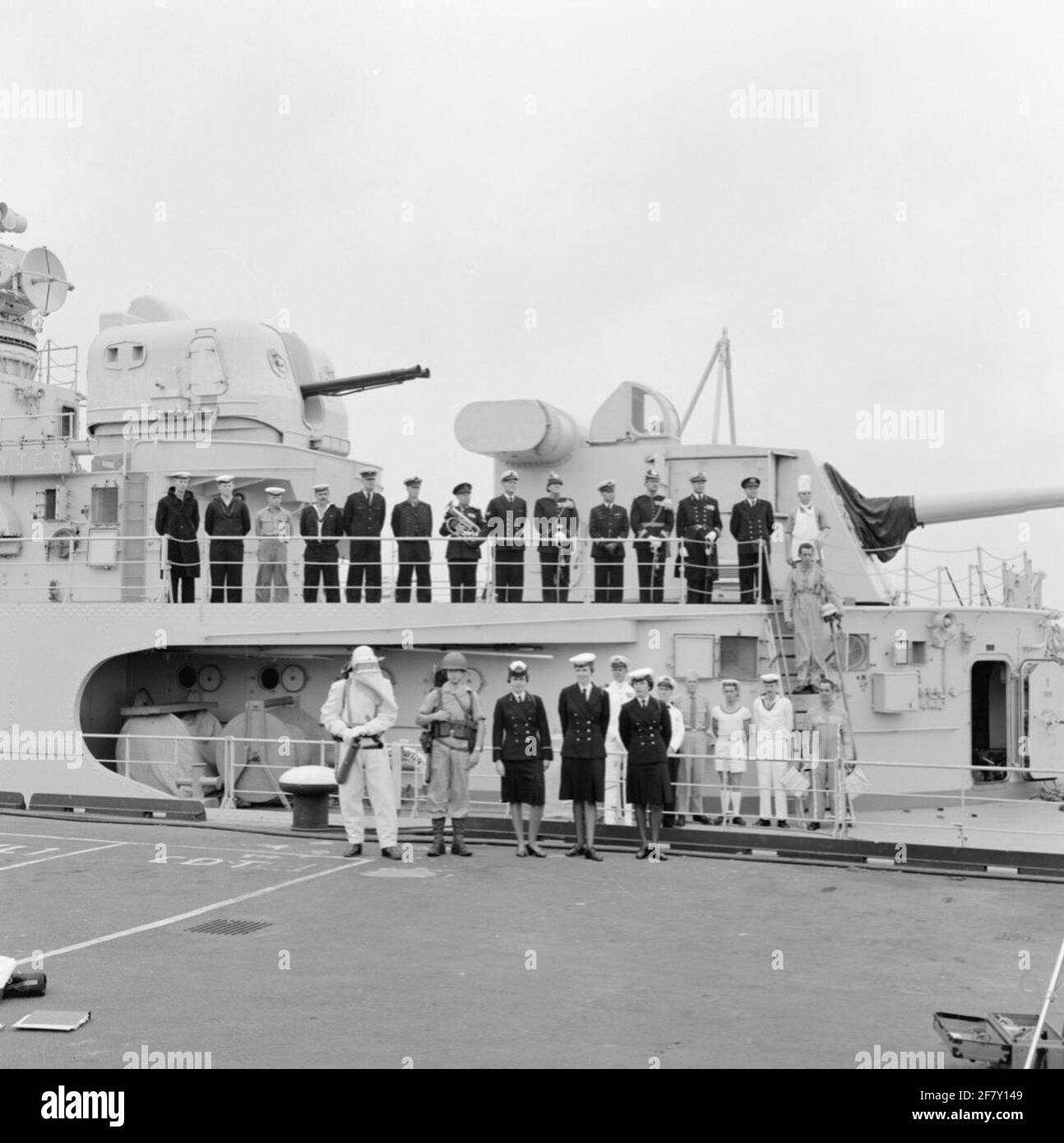 Before and at the cruiser Hr.Ms. De Ruyter (C 801) (1953-1972) shows ...