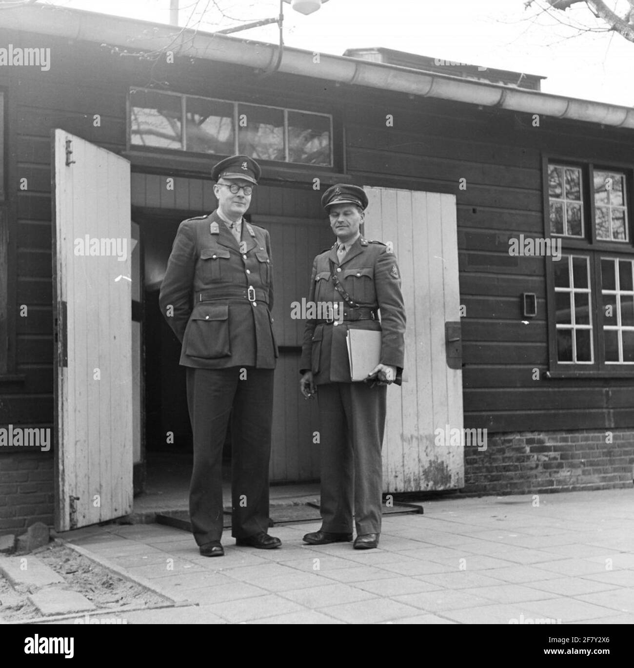 A major and a captain at the entrance doors of a military barrack Stock ...