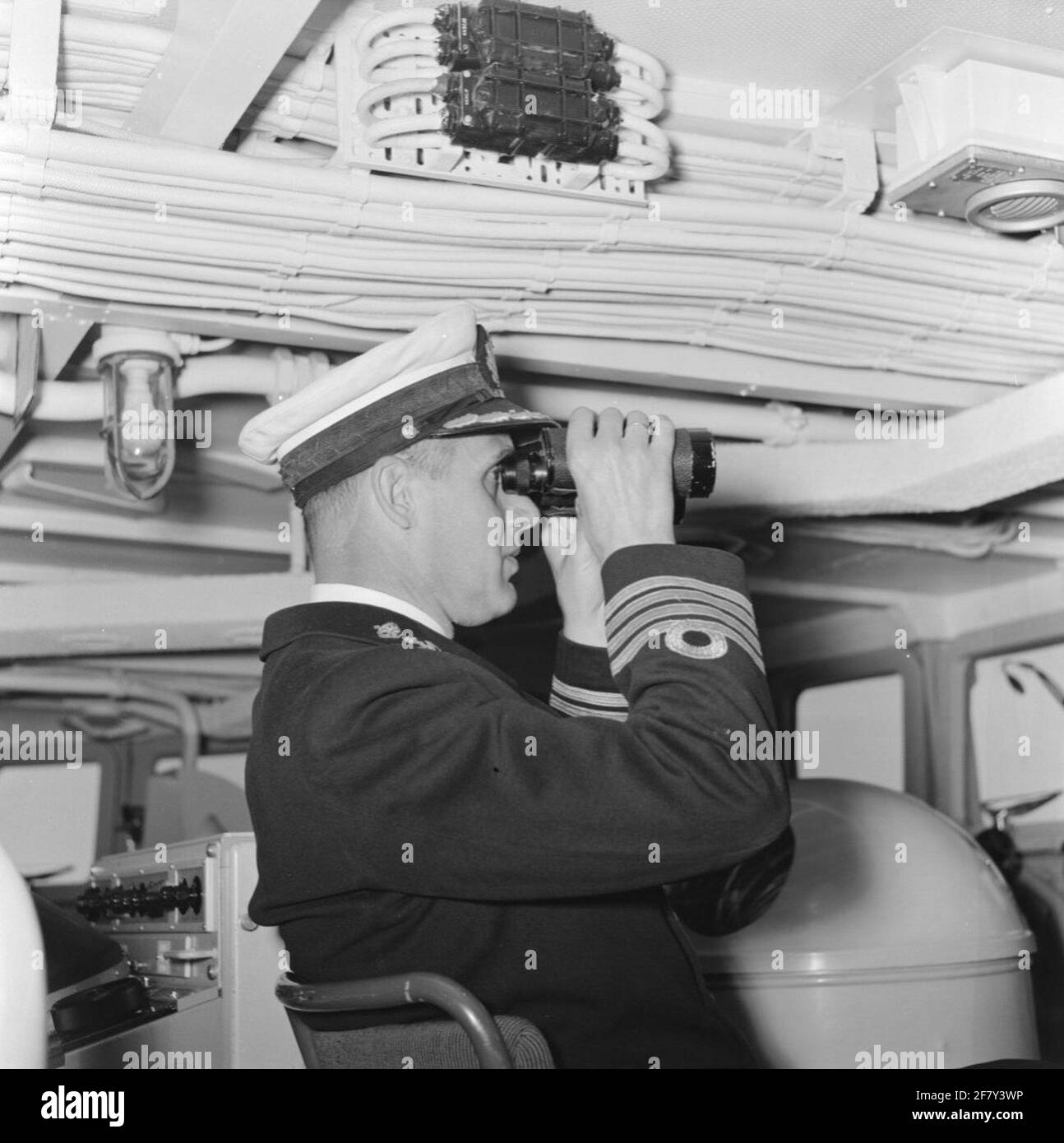 The Commander of Cruiser Hr.Ms. De Ruyter (C 801) Captain-Ter-Zee A.H.J ...