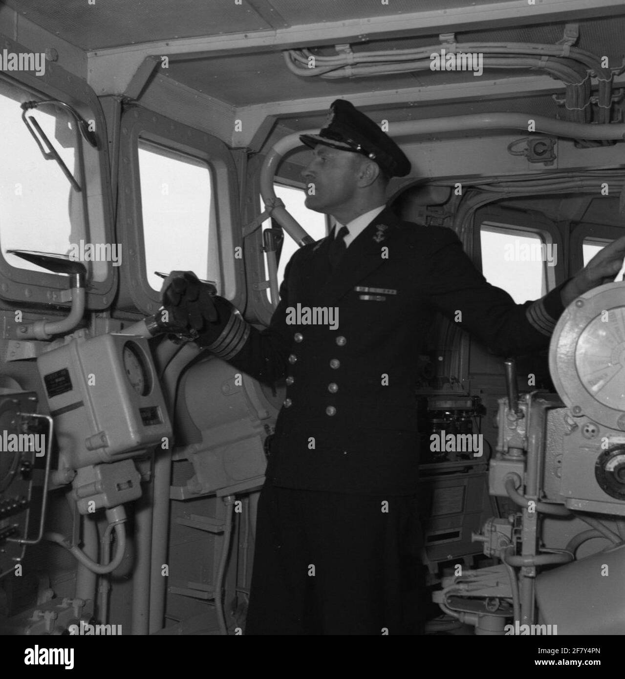 The Commander of Cruiser Hr.Ms. De Ruyter (C 801) Captain-Ter-Zee G.J ...