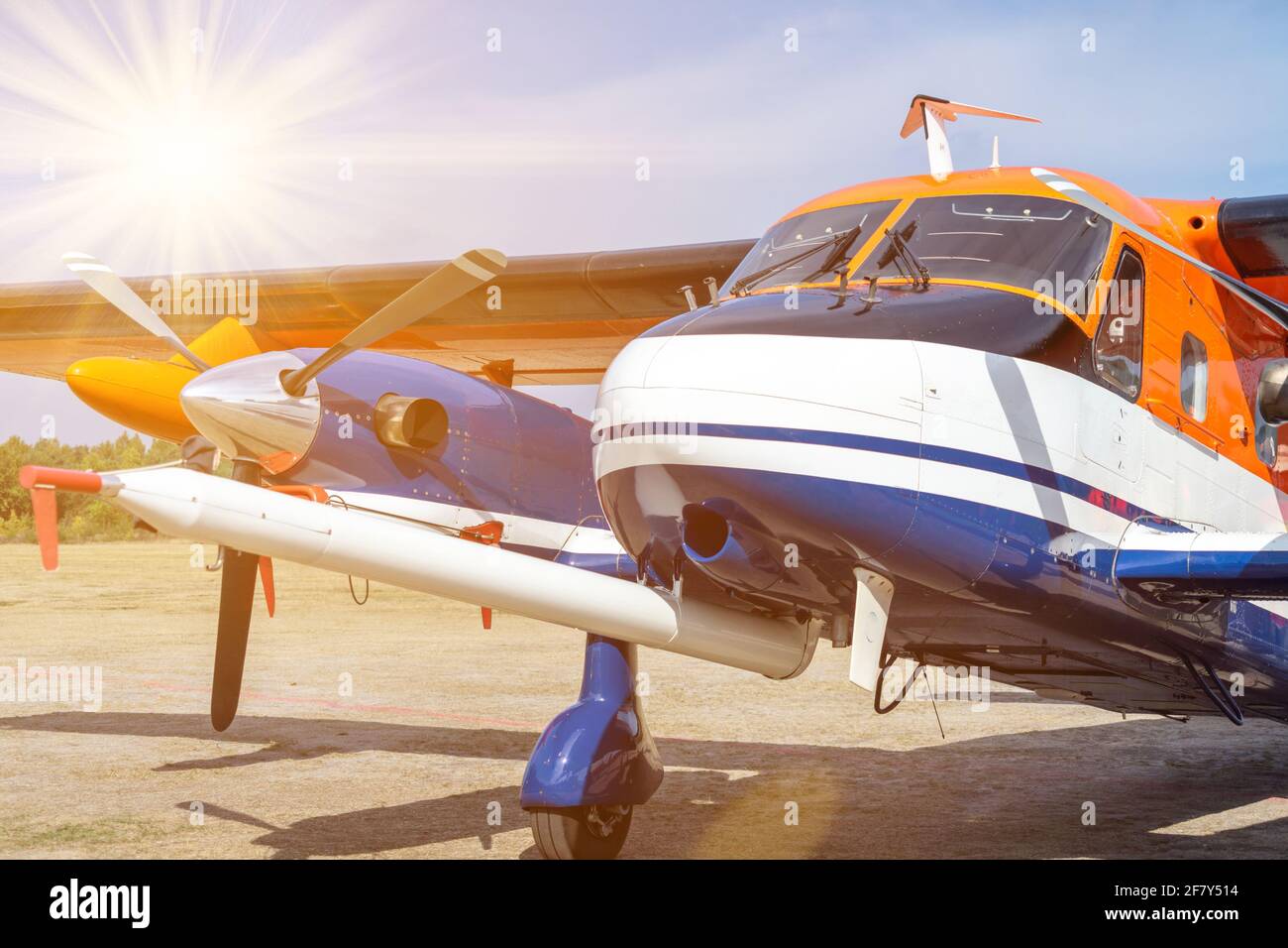 Partial view of a propeller aircraft with two engines and a painting in ...