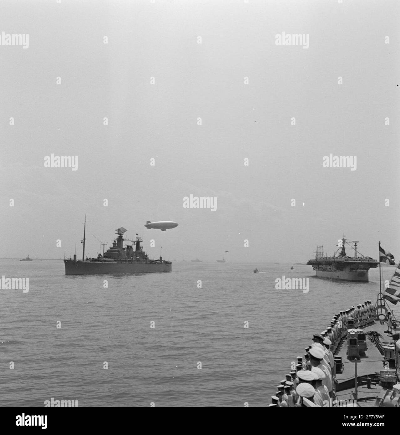 The American command ship USS Northampton (CC 1, left) and an Aircraft ...