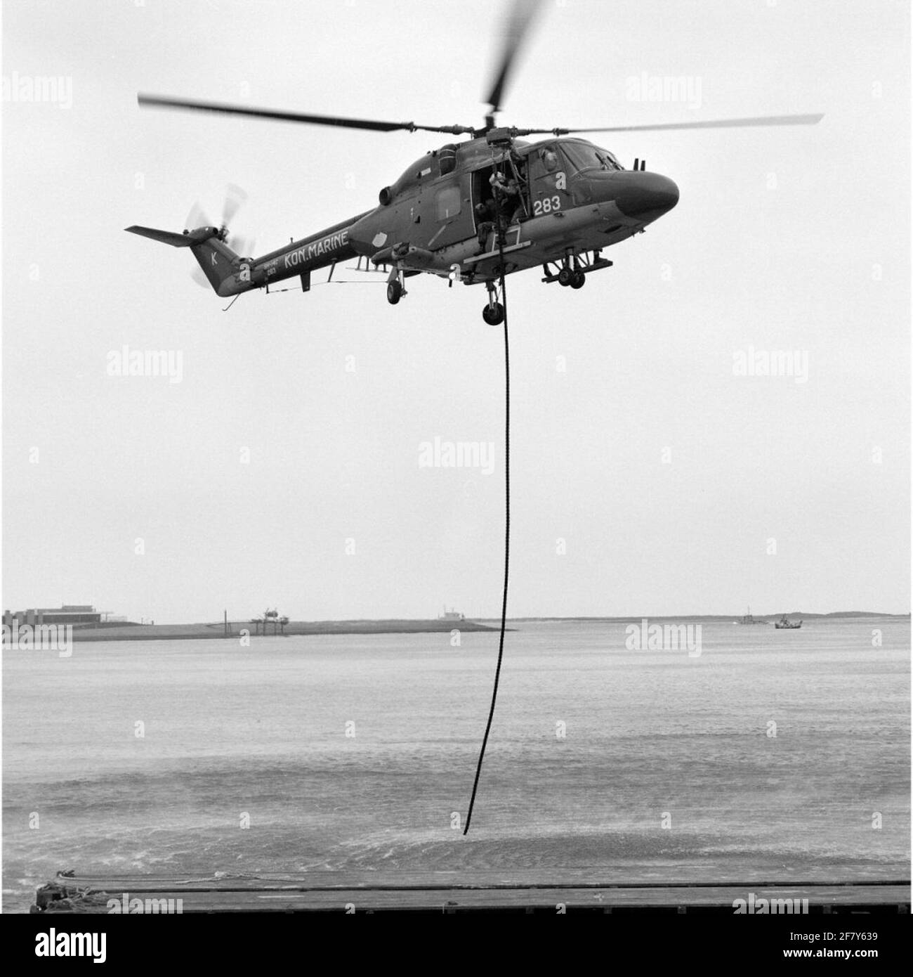 Exercise people deposit on a floating platform with the sling (hoisting ...