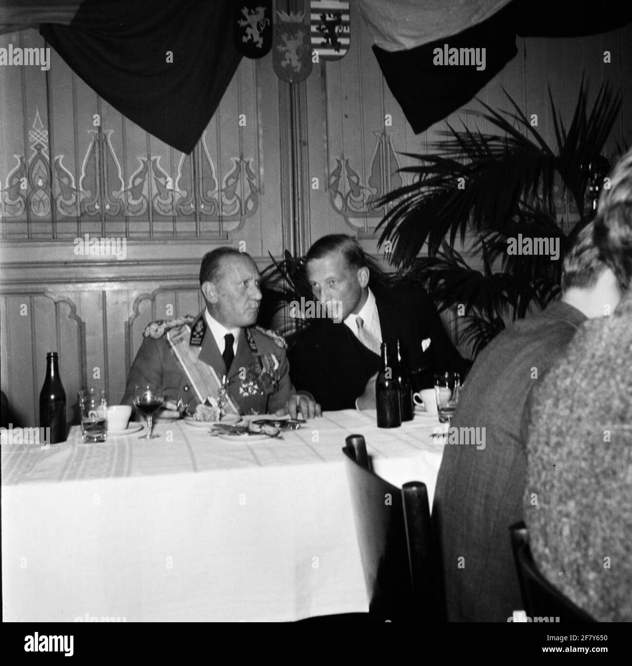 Conversation between a politician and a general during the visit of the ...