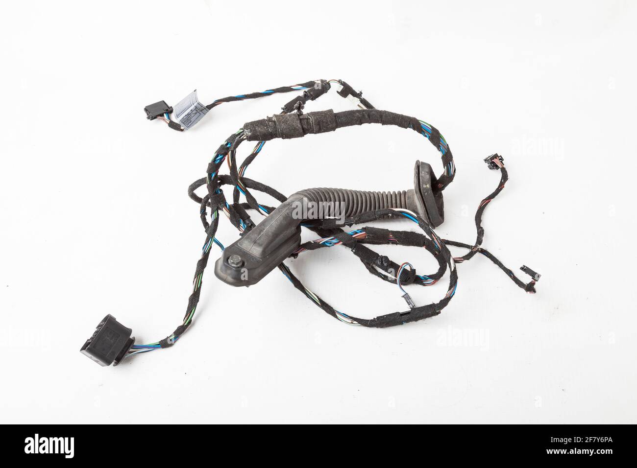 A cable of matted wires of different colors with connectors in the ...