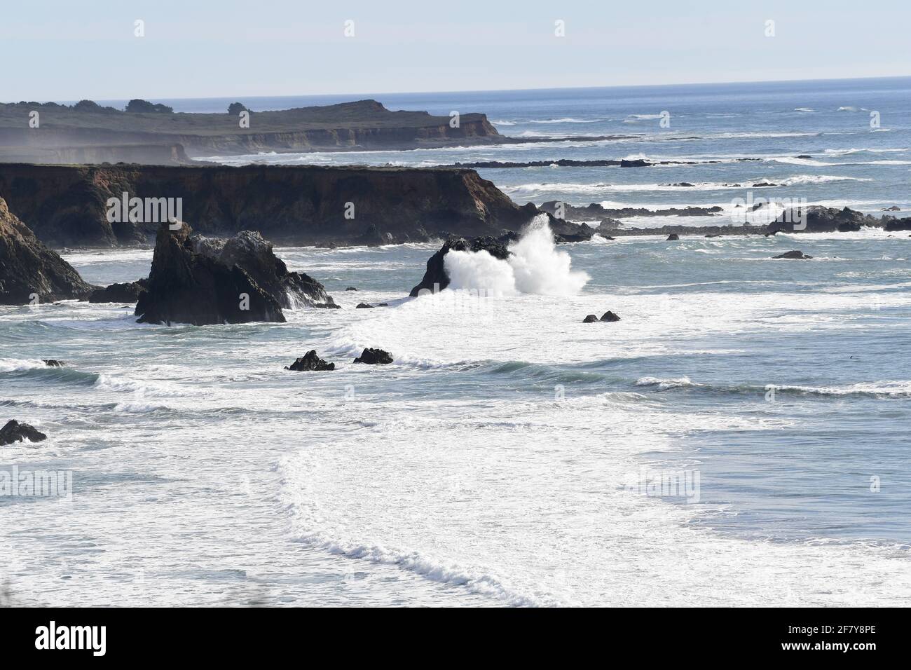 Pacific ocean waves crashing on rocky coast line, California central ...