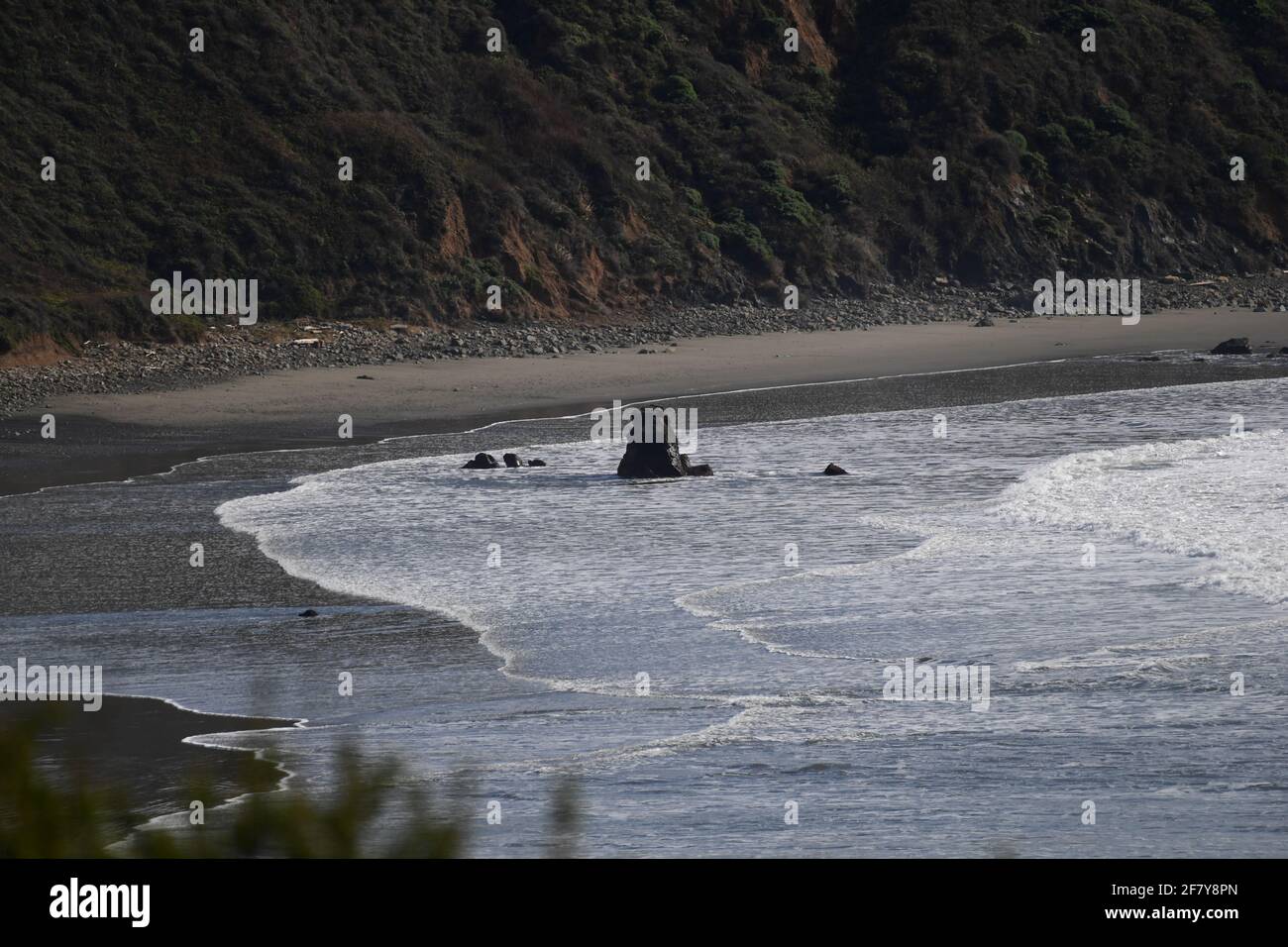 Pacific ocean waves crashing on rocky coast line, California central ...