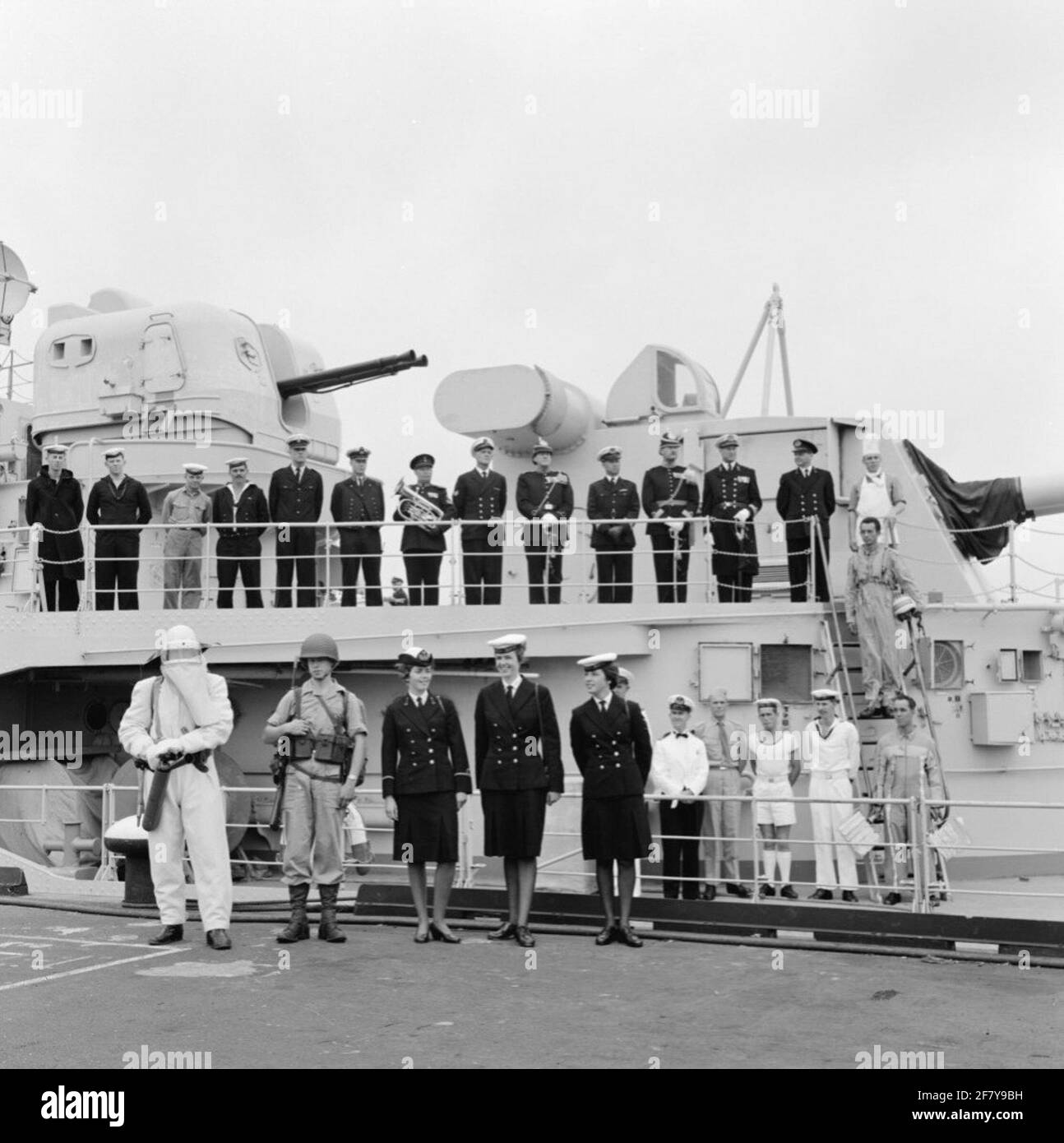 Before and at the cruiser Hr.Ms. De Ruyter (C 801) (1953-1972) shows ...