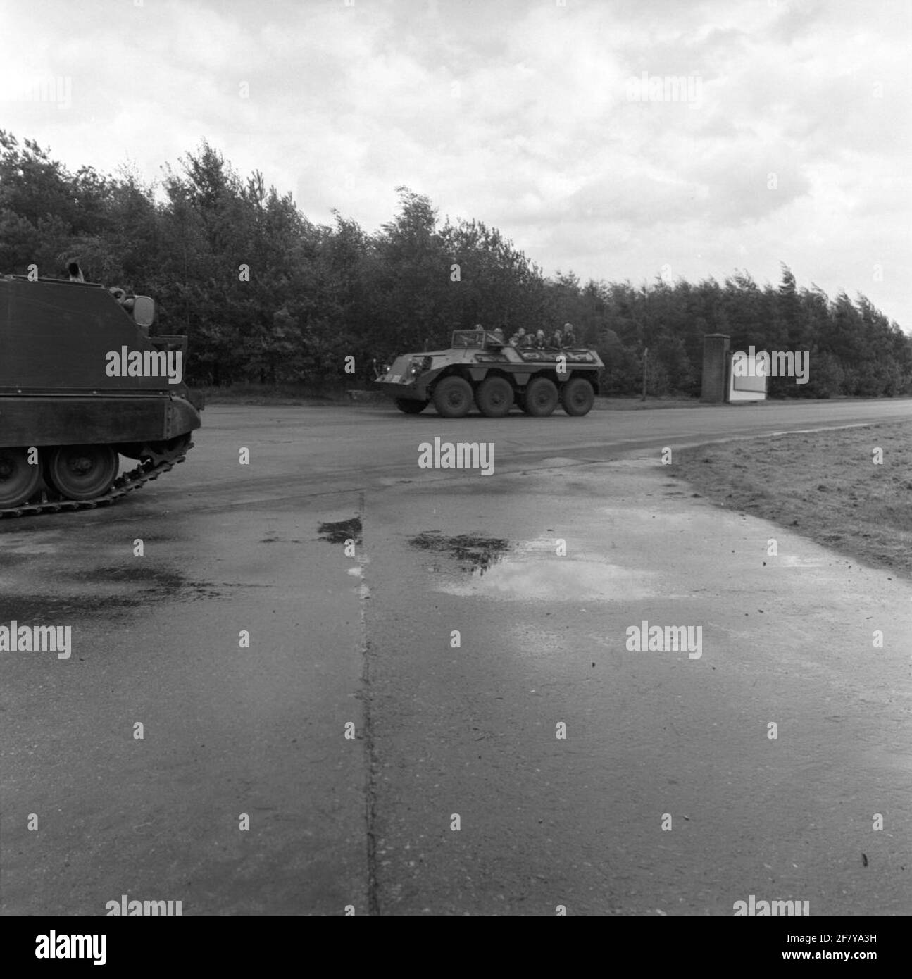 Soldiers and public on a DAF YP-408 armor vehicle during an open day at ...