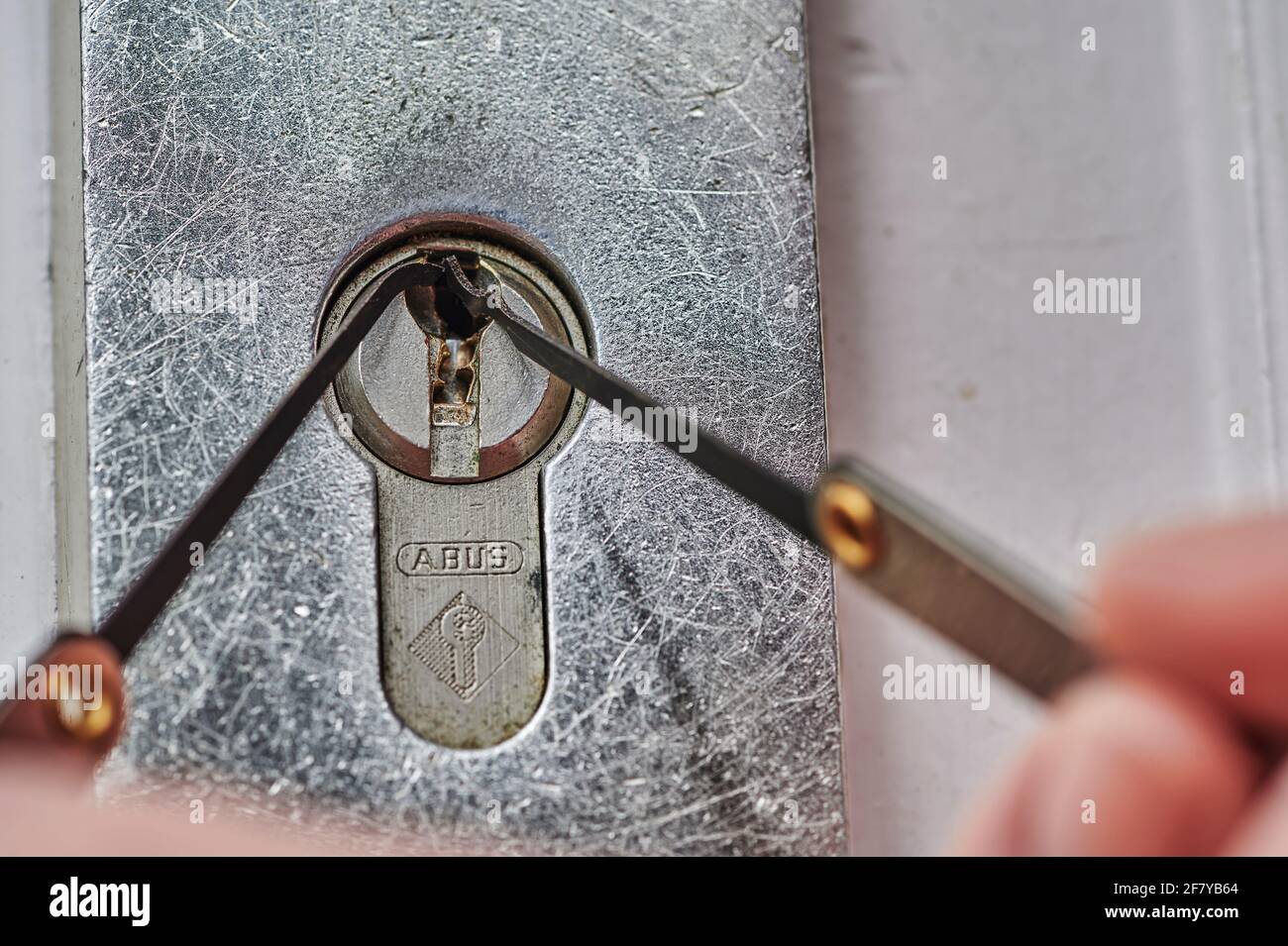 Berlin, Germany - April 10, 2021: Photo of opening a door lock with ...
