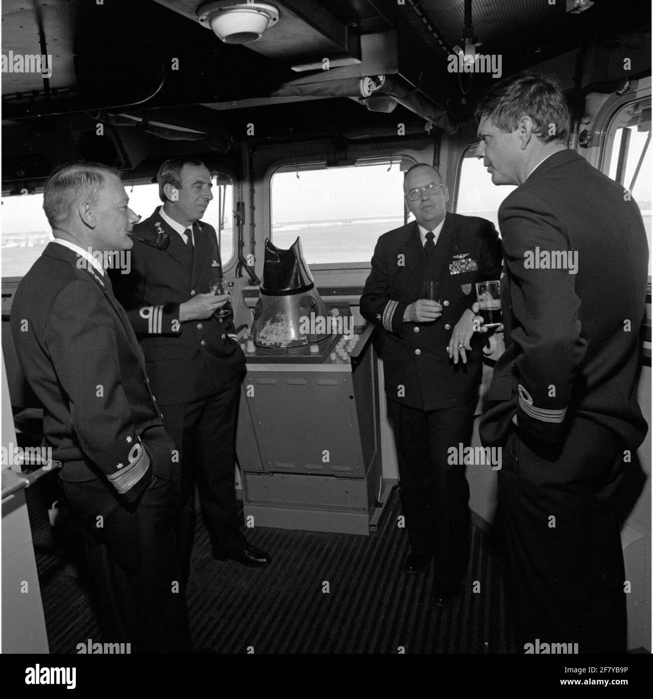 An American Admiral (second from the right) visits the naval base Den ...