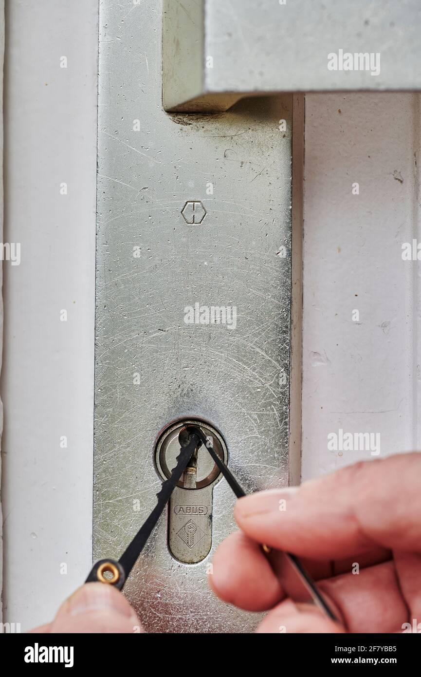 Berlin, Germany - April 10, 2021: Photo of opening a door lock with ...