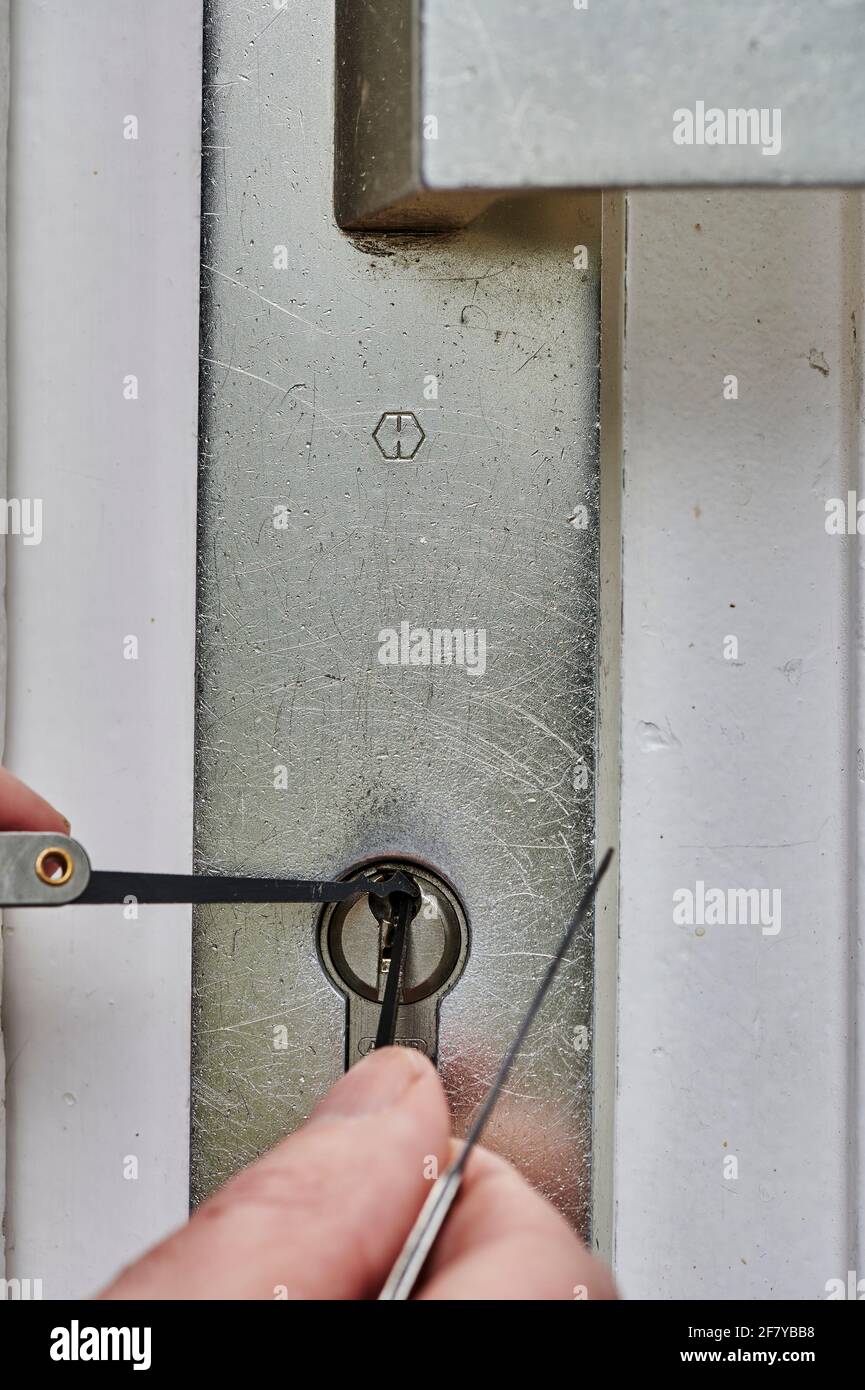 Berlin, Germany - April 10, 2021: Photo of opening a door lock with ...
