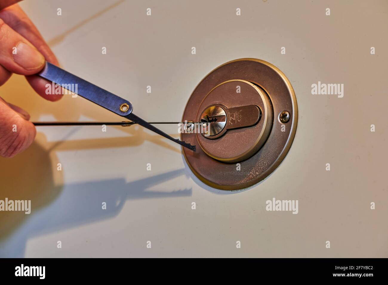 Berlin, Germany - April 10, 2021: Photo of opening a door lock with ...