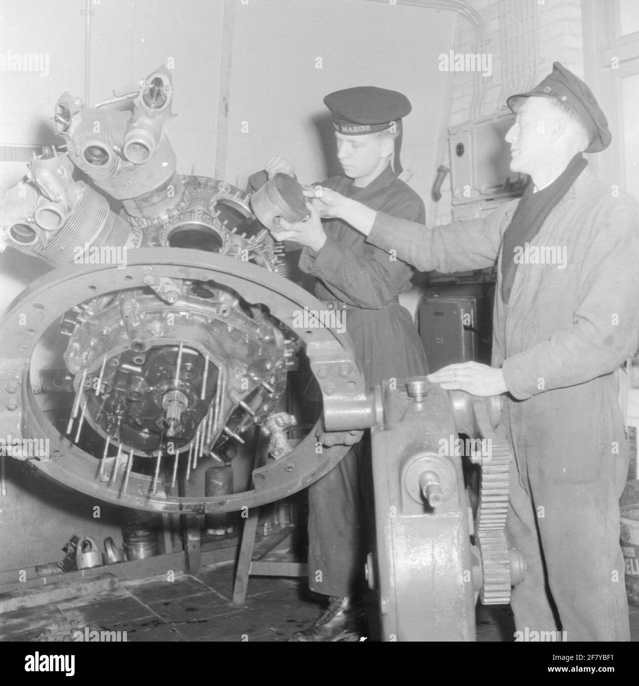 Airplane maker in training at the engine of a harpoon. Is part of ...
