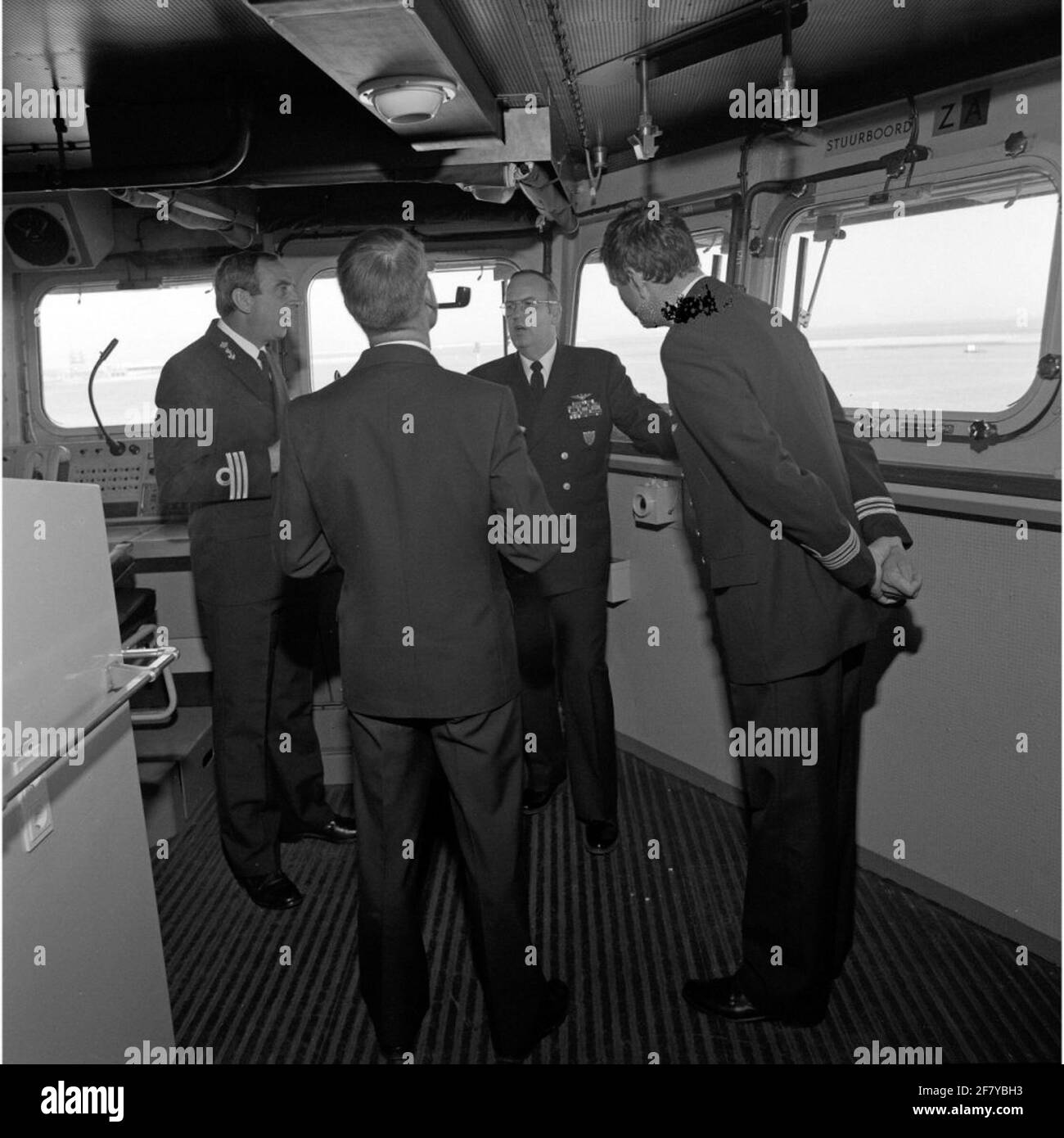 An American Admiral (second from the right) visits the naval base Den ...