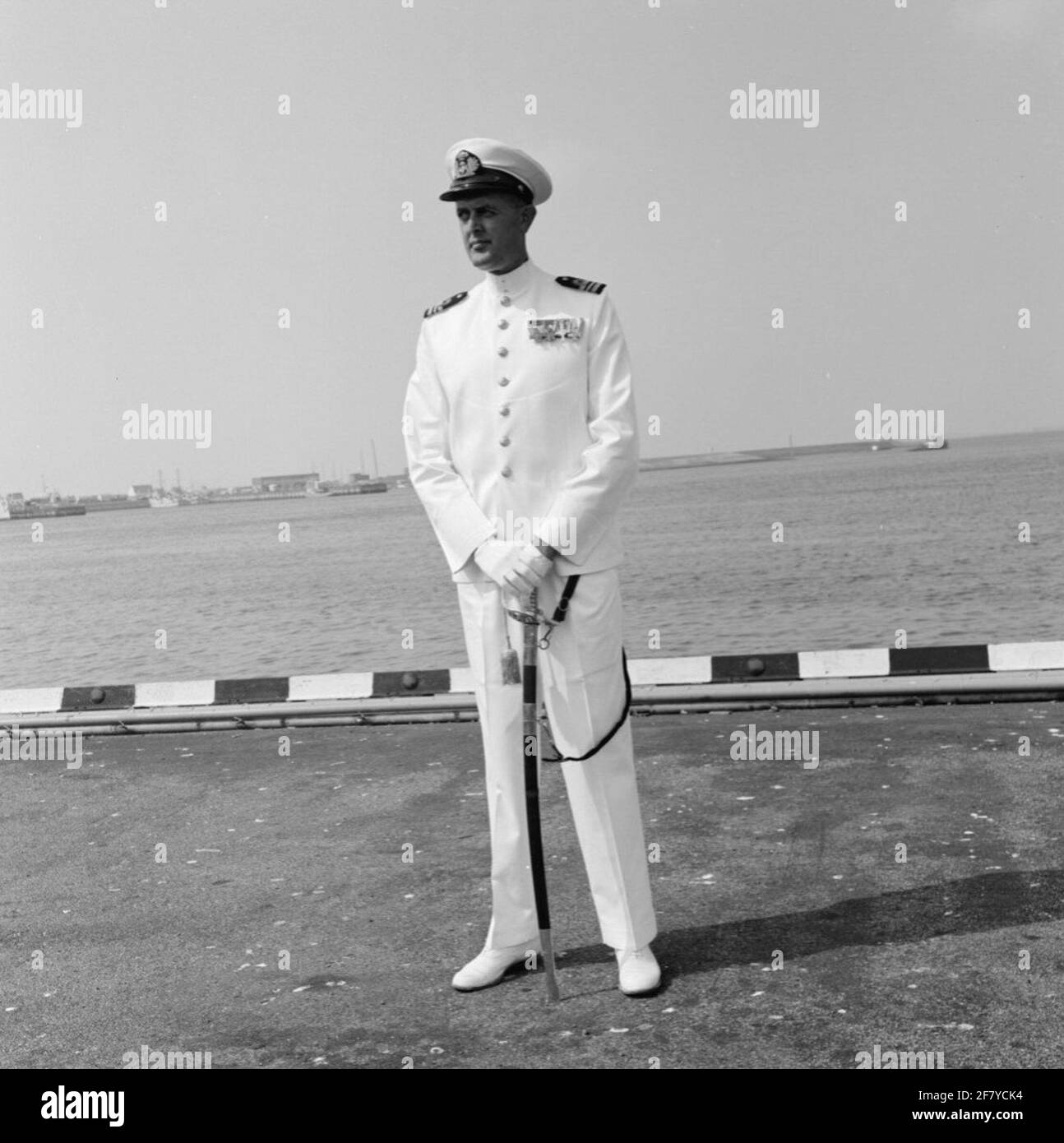 On a jetty, naval crew shows the variety of uniforms that are worn at ...