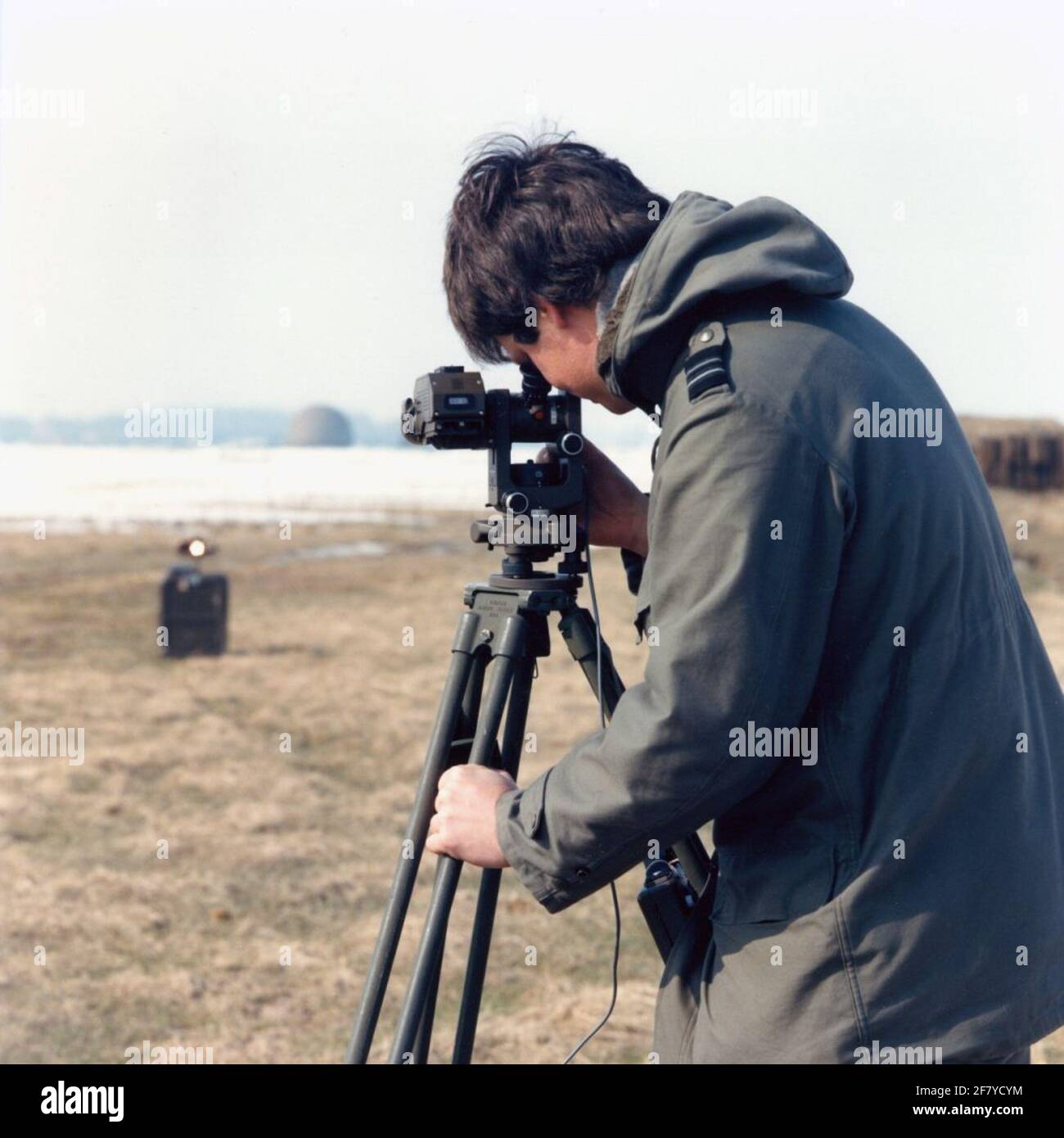 A "Battery Control Officer (BCO)" is aligning led weapon equipment ...