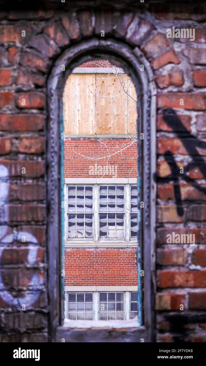 red brick window with view outside in an abandoned building Stock Photo ...