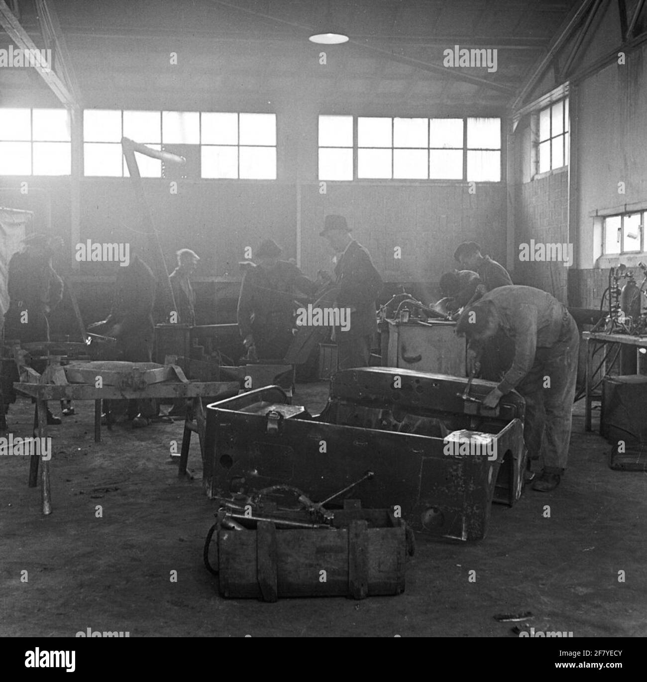 Vehicle workshop where the bodywork (right) has been collected for ...