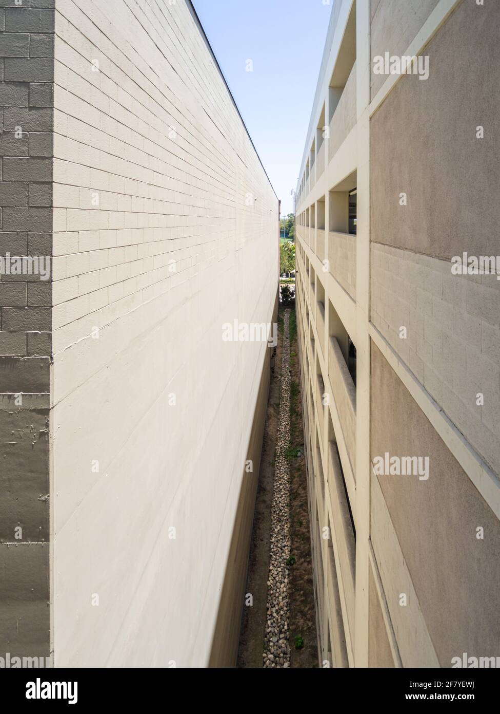 geometrical tight space in between concrete buildings Stock Photo - Alamy