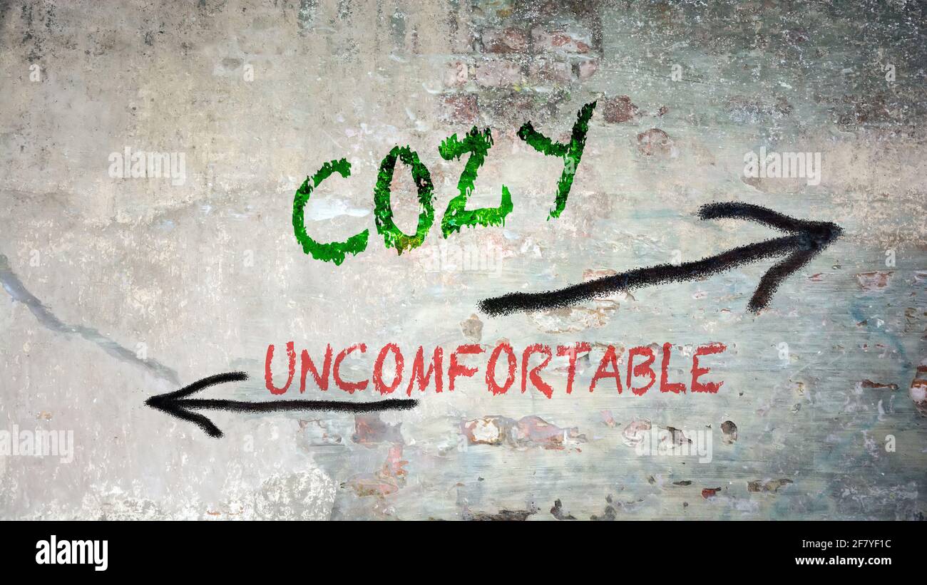 Street Sign the Direction Way to Cozy versus Uncomfortable Stock Photo ...