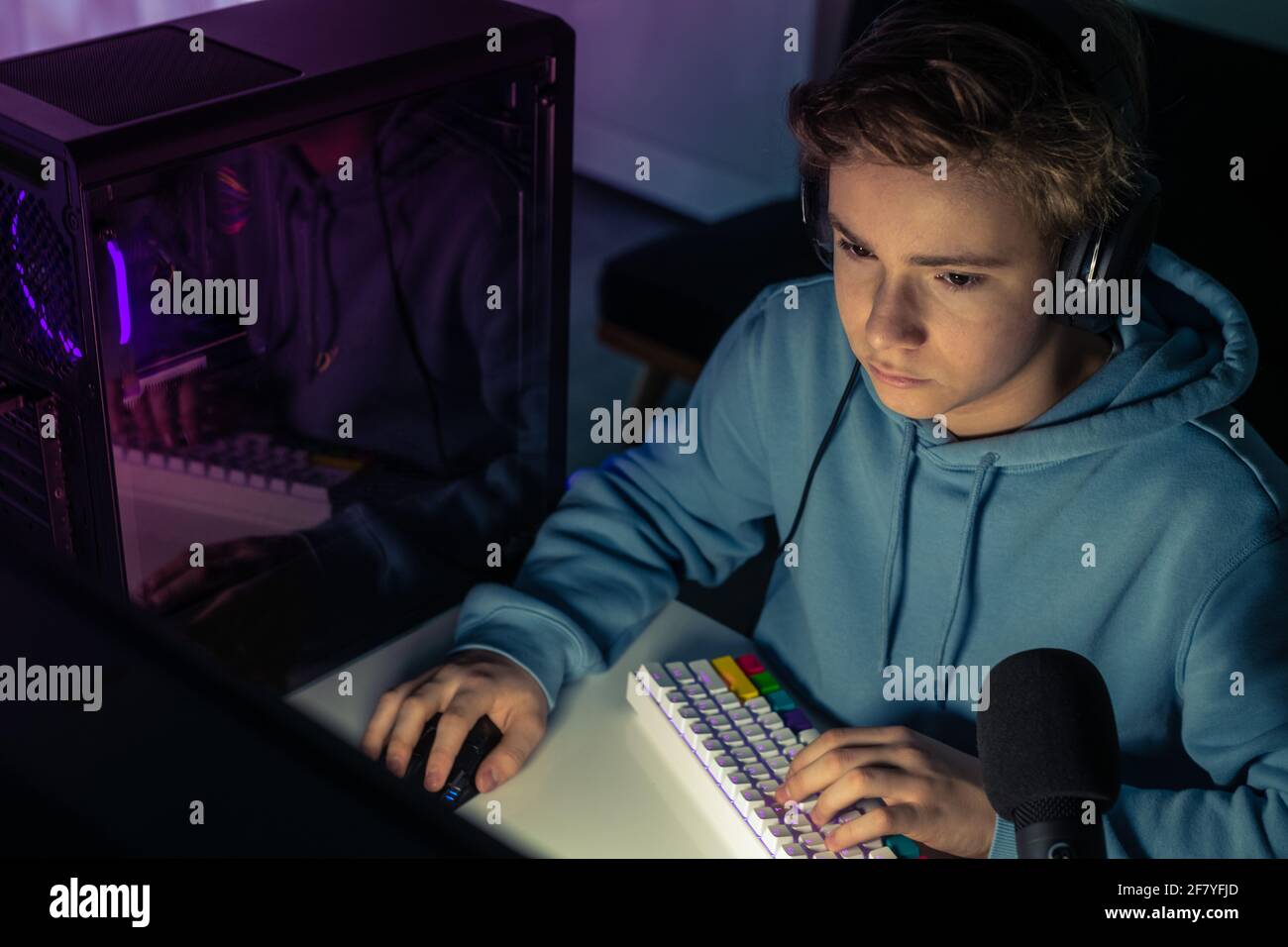 Video game streamers playing on their home console. Teenager playing ...