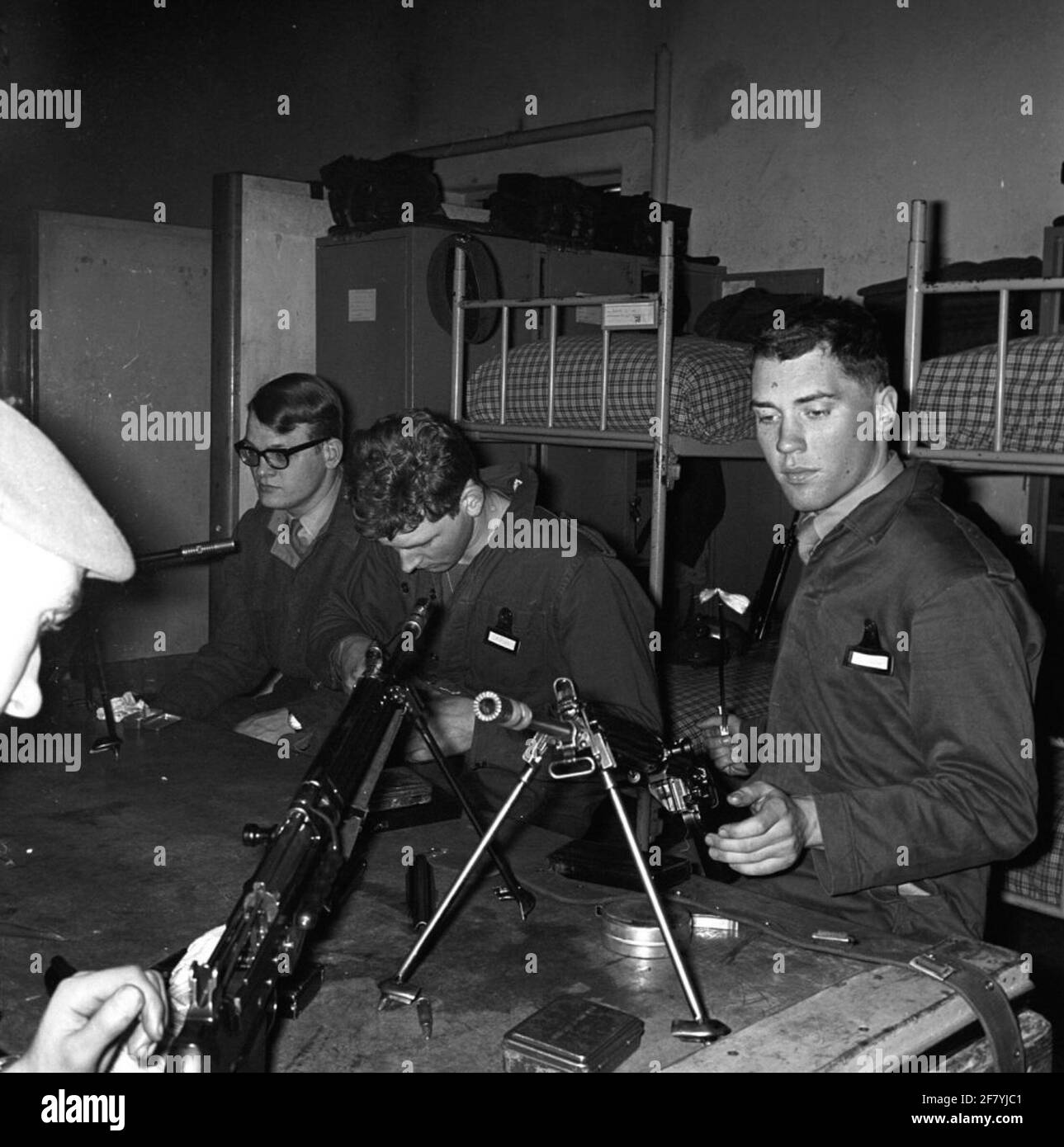 A new class of conscript soldiers commits arms maintenance at the fal ...