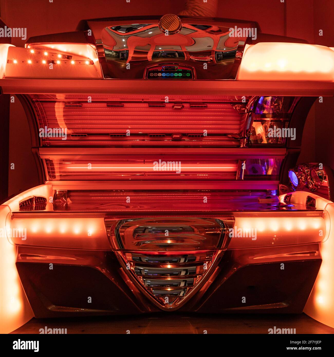 Bed solarium with red color Stock Photo - Alamy
