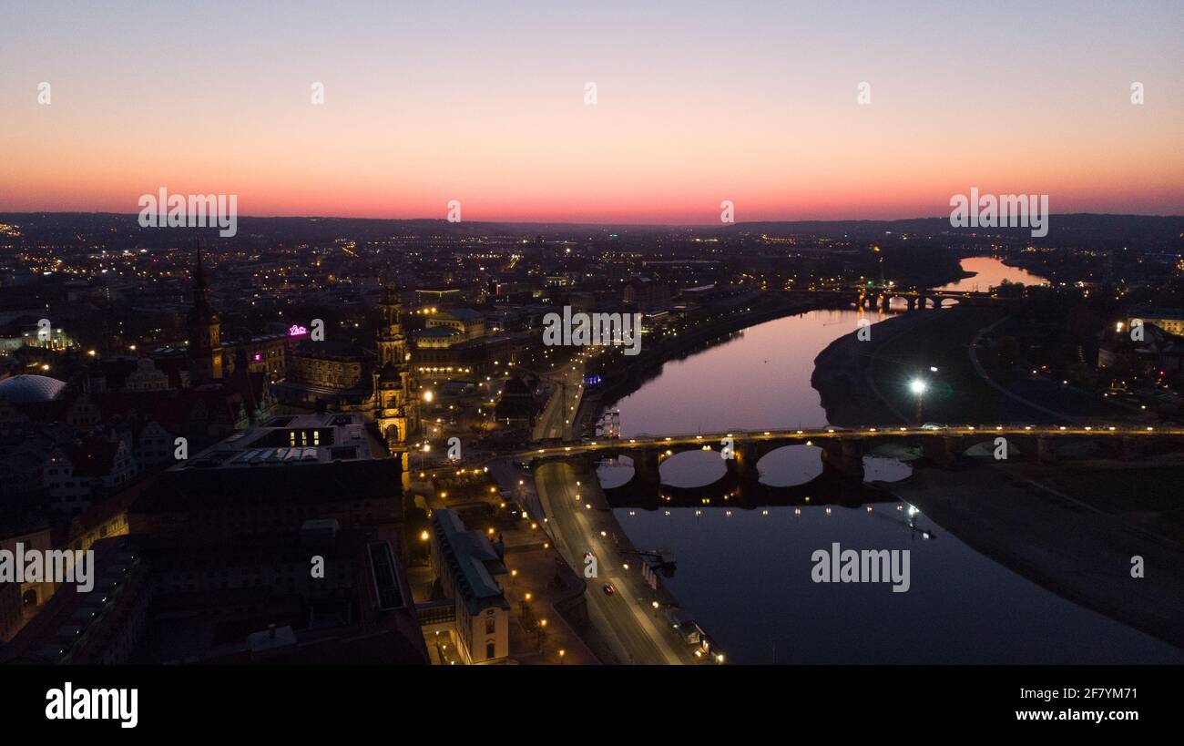 Beautiful scenery of a cityscape with illuminated buildings in Dresden ...