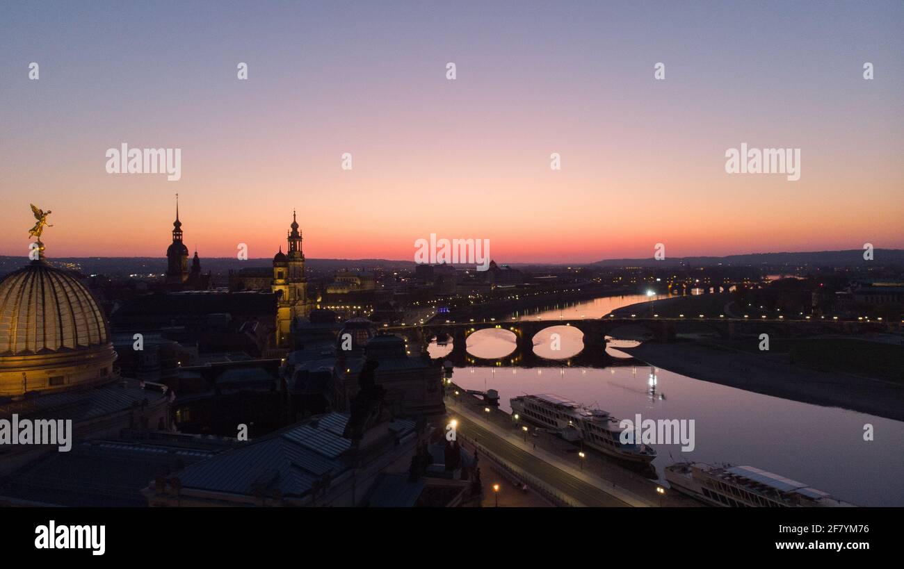 Beautiful scenery of a cityscape with illuminated buildings in Dresden ...