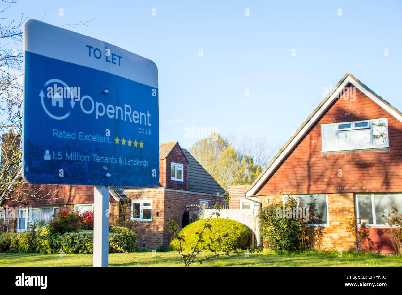 ToLet by Open Rent company next to bungalow type building Stock Photo ...