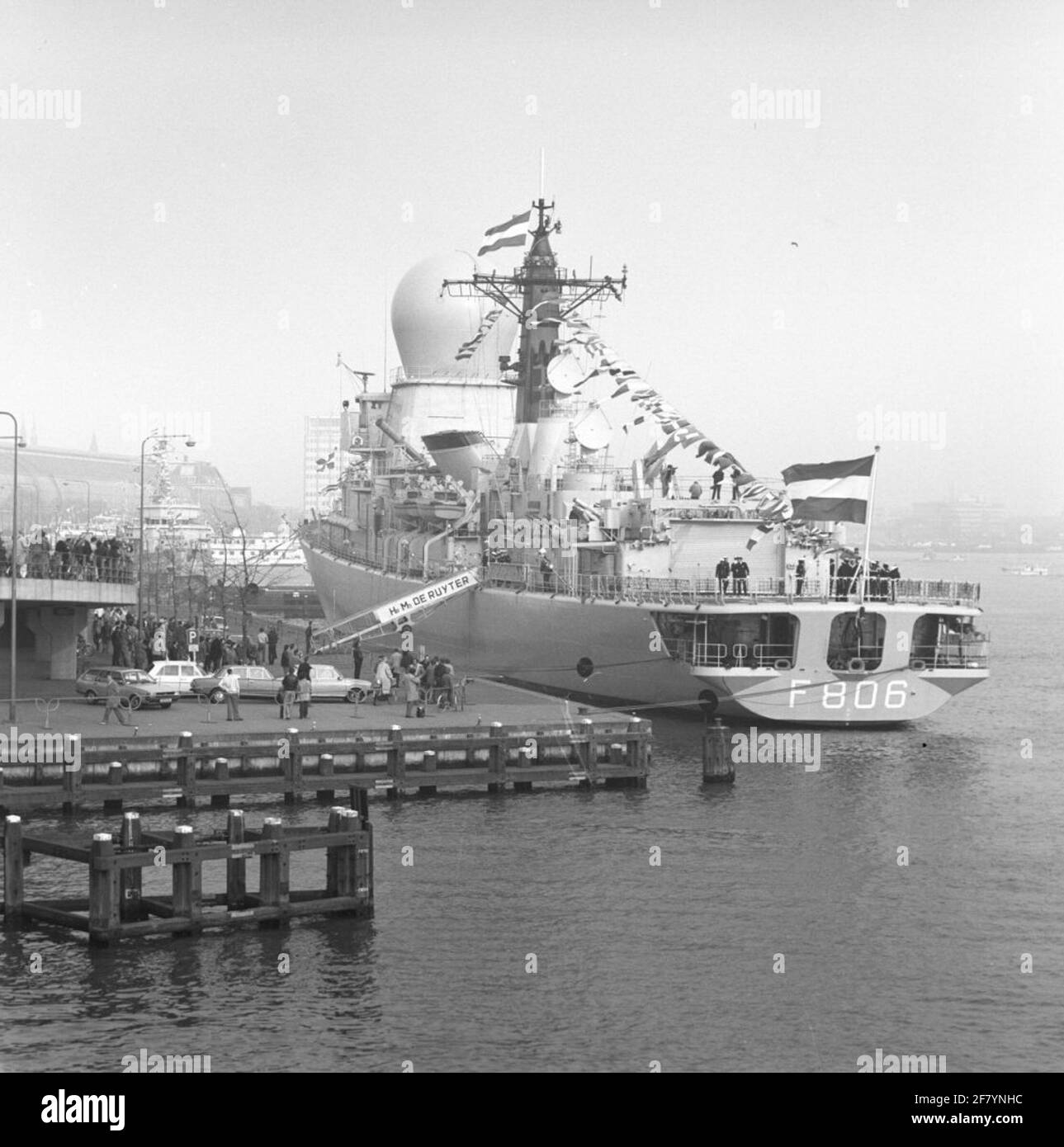 HR.MS guided arms factory. De Ruyter is moored behind Amsterdam Central ...