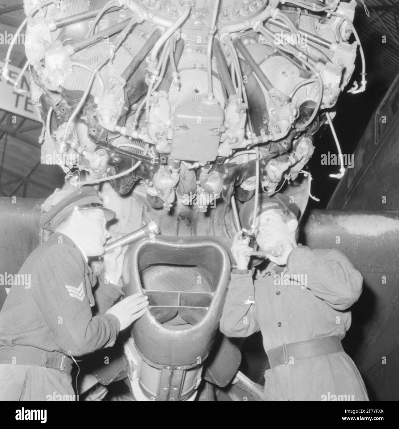 Airplane maker in training at the engine of a harpoon. Is part of ...