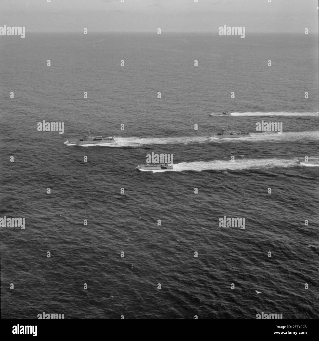 German mine sweeps and landing boats at sea Stock Photo - Alamy