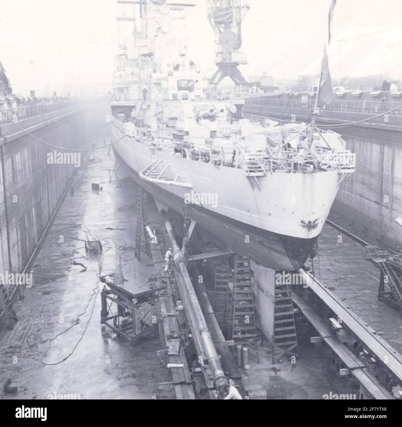 Cruiser Hr.Ms. De Ruyter (1953-1972) Removing a propeller shaft at the ...