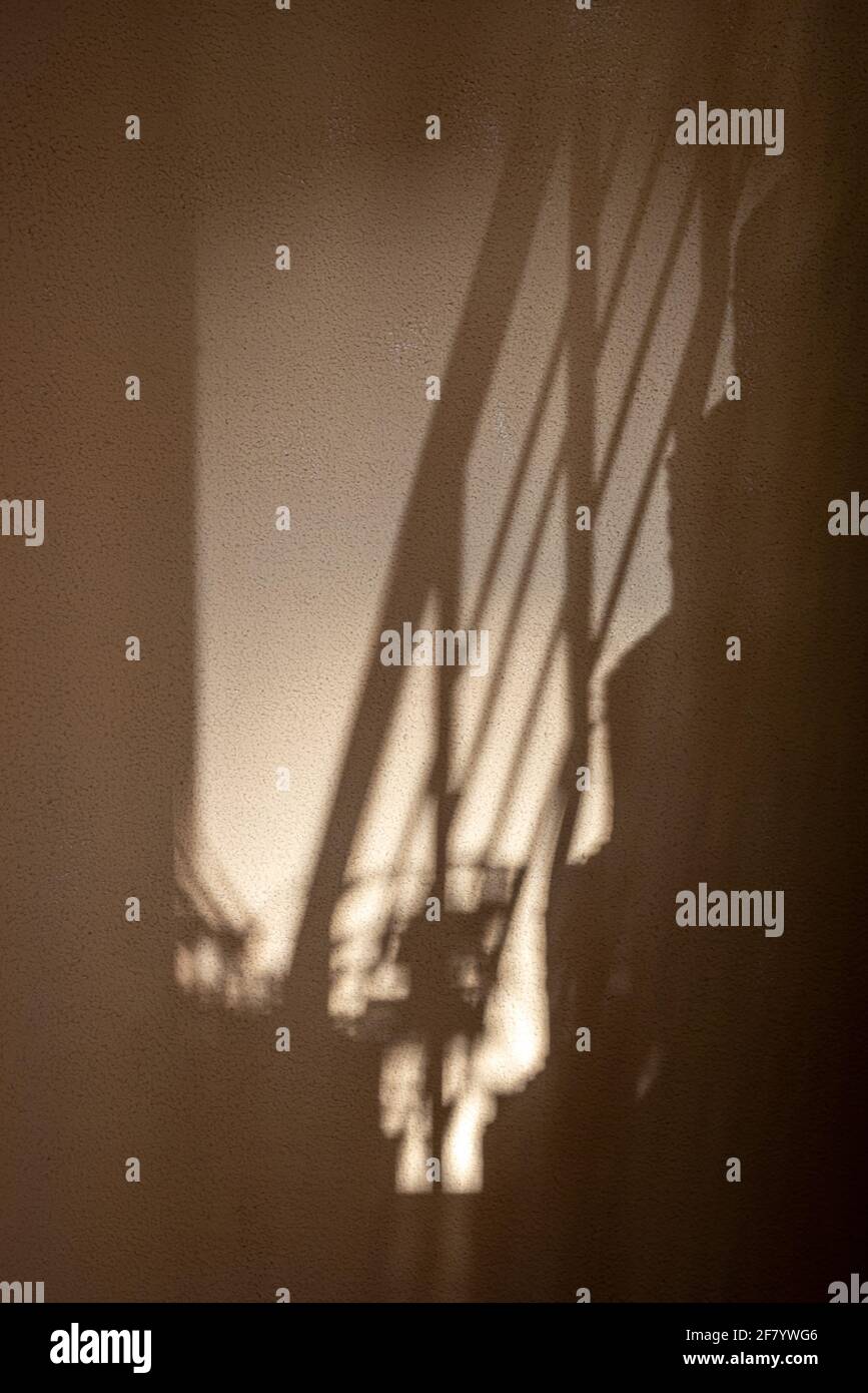 Dark shadows on white wall hi-res stock photography and images - Alamy