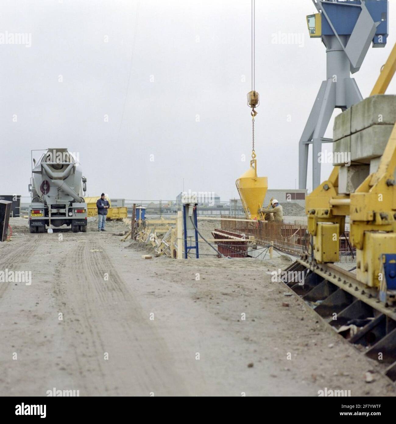 Pouring concrete for the new power / water plant for the new port in ...