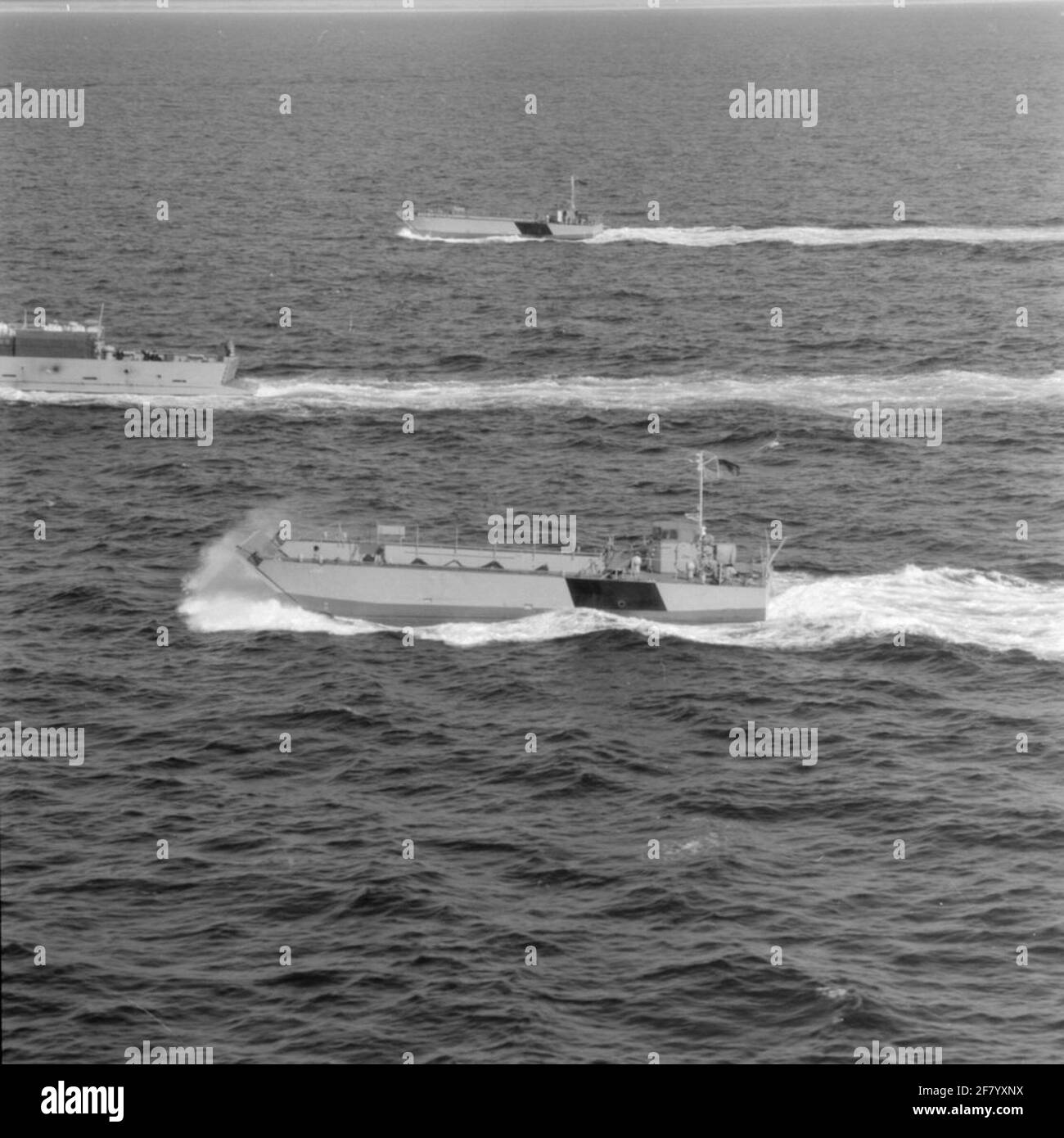 German mine sweeps and landing boats at sea Stock Photo - Alamy